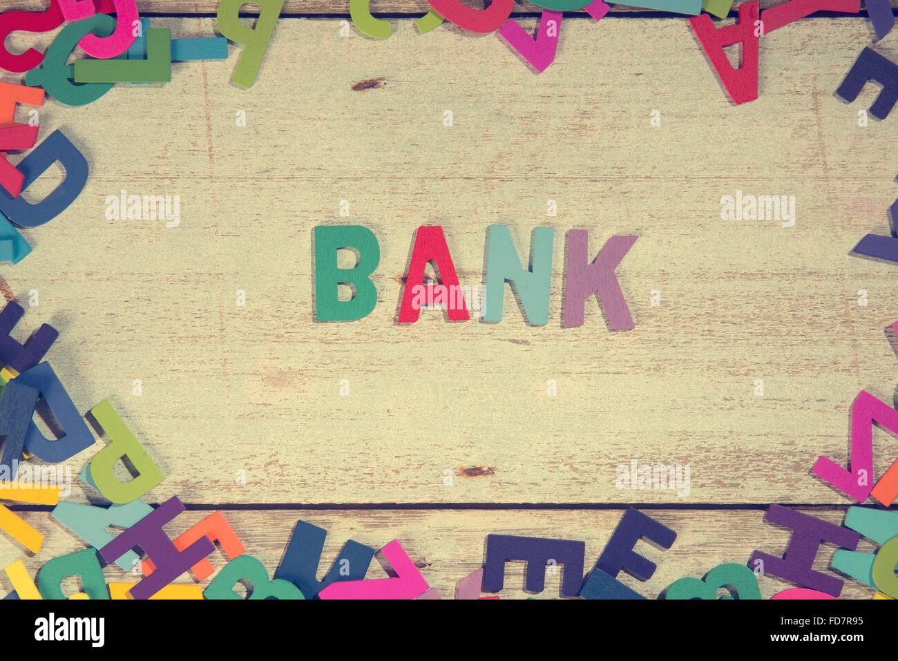 bank word block concept photo on plank wood Stock Photo - Alamy