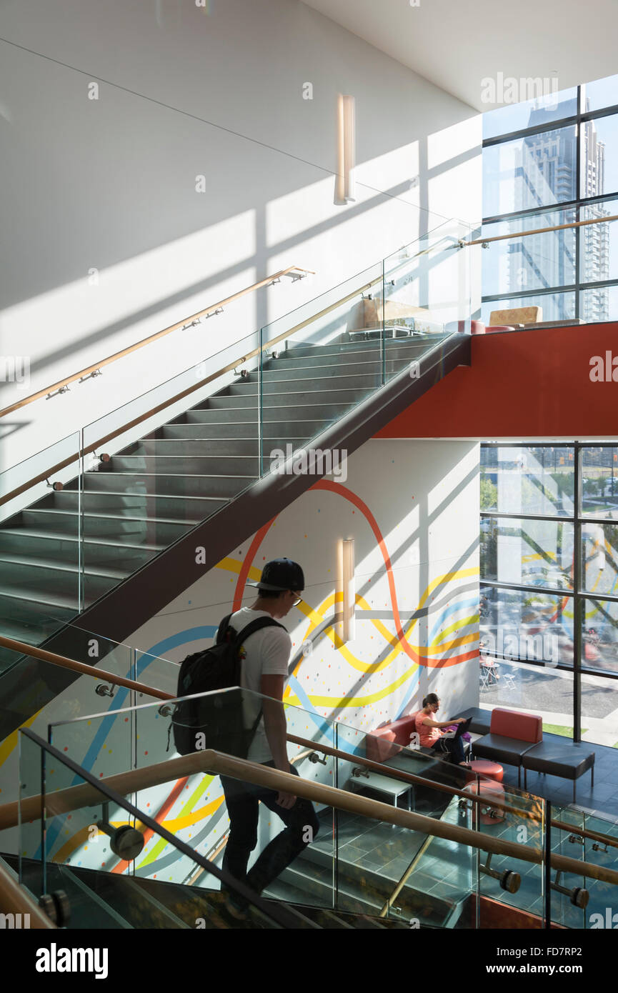 Students walking down stairs in a college campus Stock Photo - Alamy