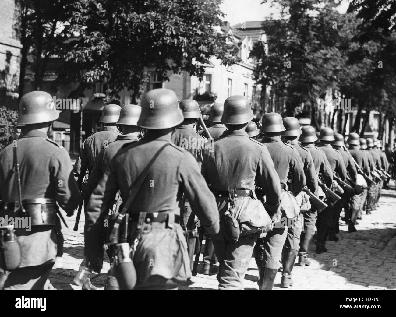 Column of German soldiers in a garrison town Stock Photo - Alamy