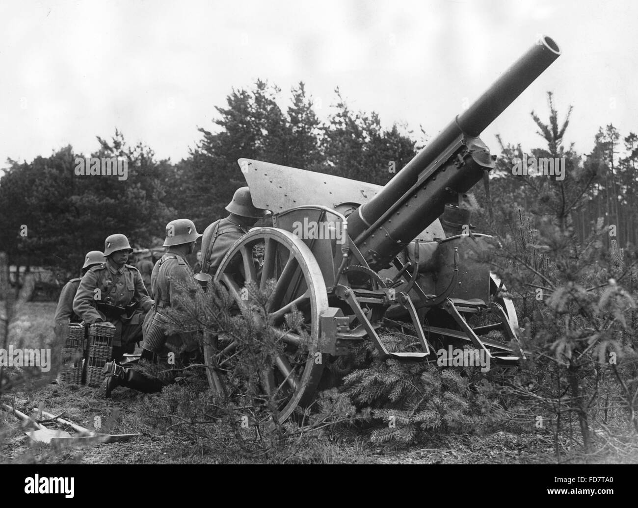 Soldiers with field howitzer during an exercise, 1935 Stock Photo - Alamy