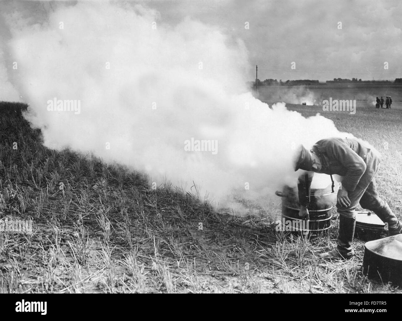 Reichswehr soldier with fog barrel during a maneuver, 1925 Stock Photo ...
