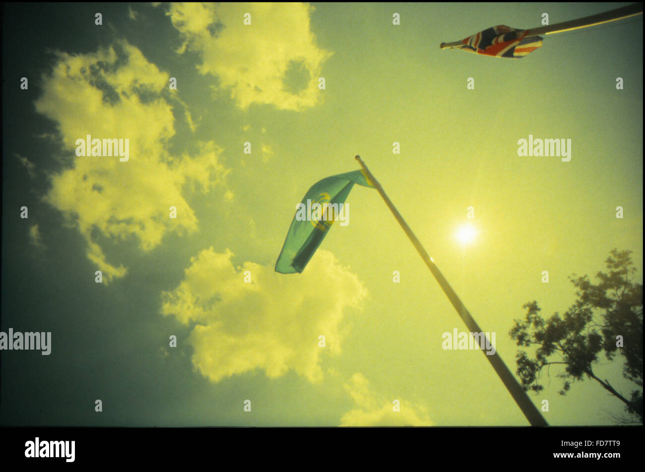 Flags against sun hi-res stock photography and images - Alamy