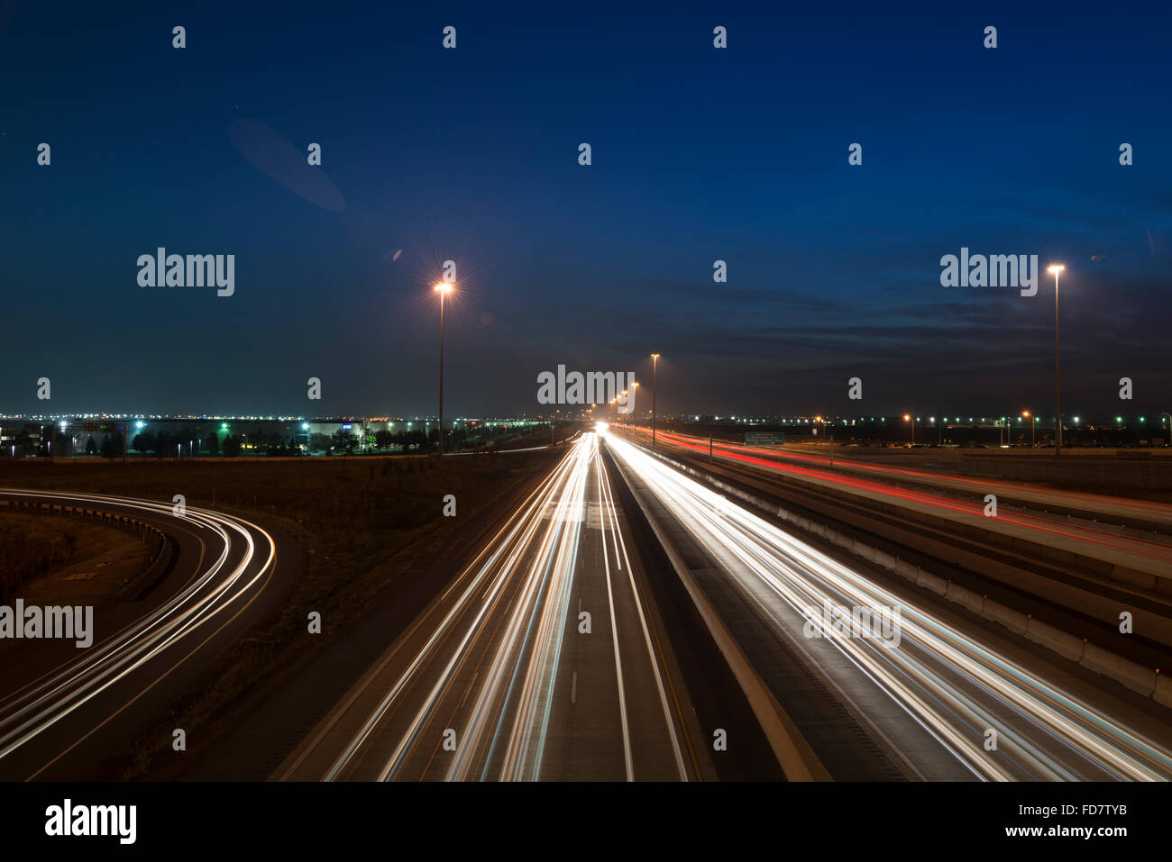 White & red light trails of traffic on highway Stock Photo - Alamy