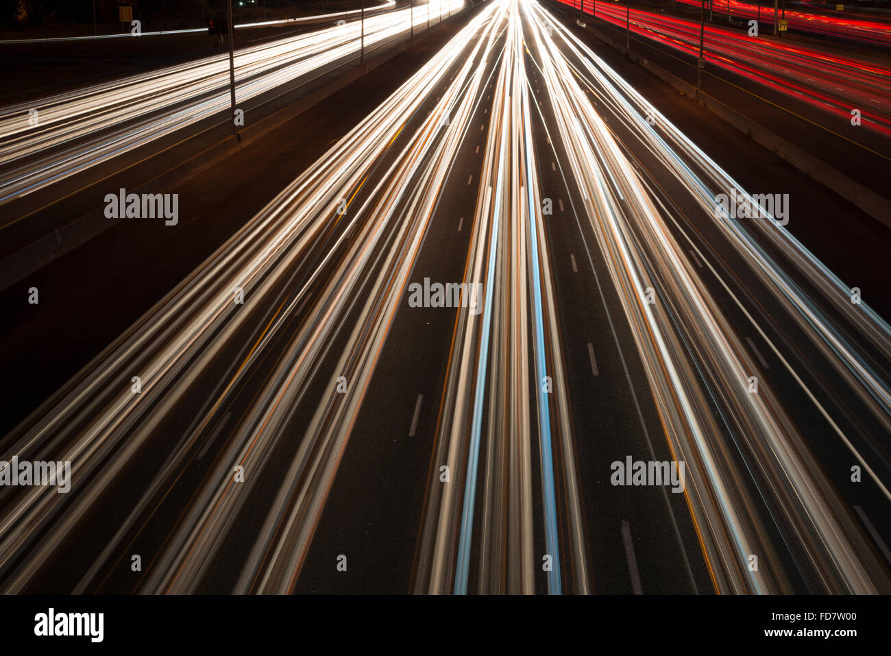 White & red light trails of traffic on highway Stock Photo - Alamy