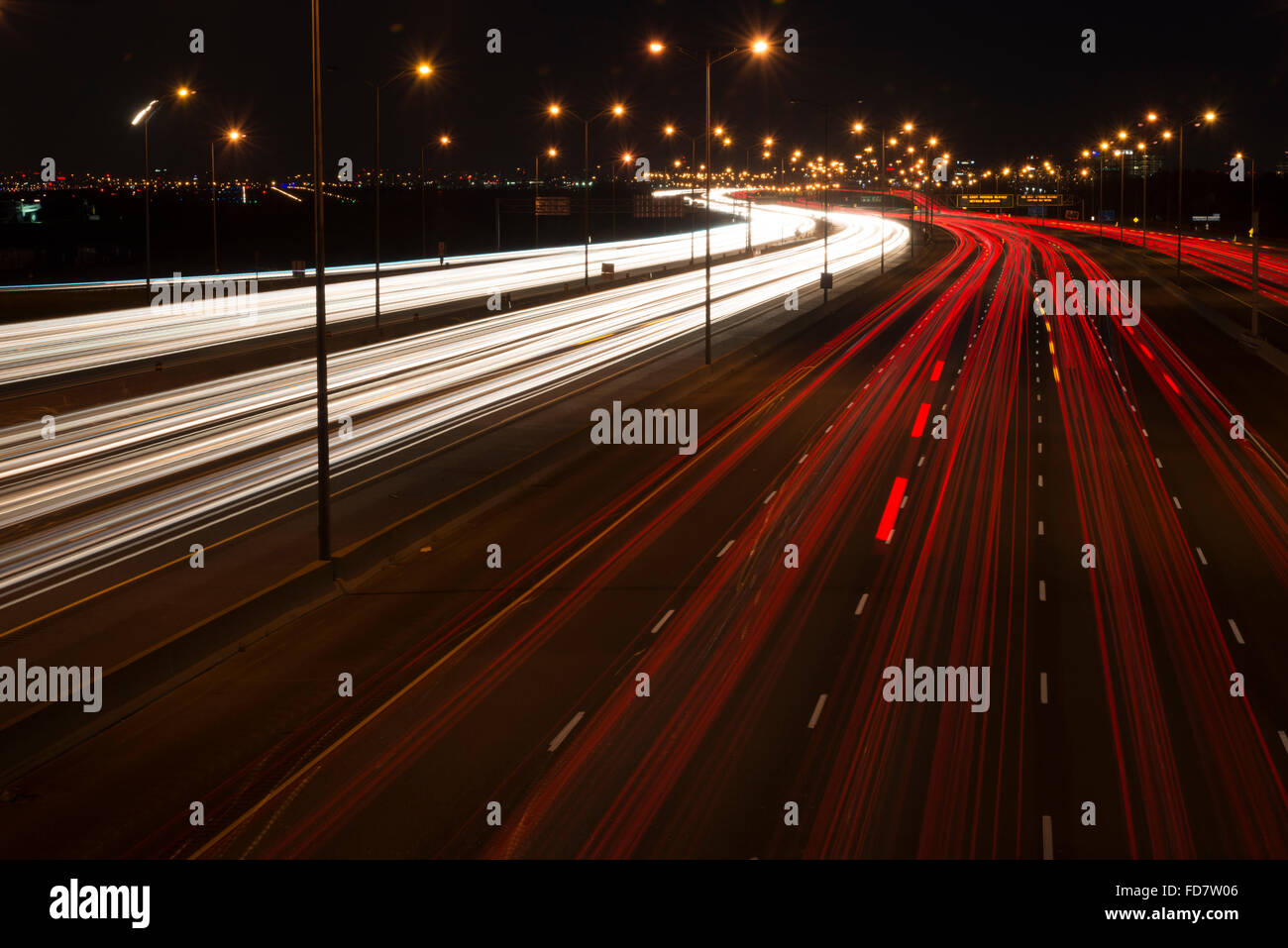 White & red light trails of traffic on highway Stock Photo - Alamy