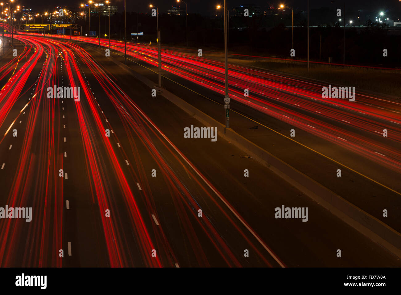 White & red light trails of traffic on highway Stock Photo - Alamy