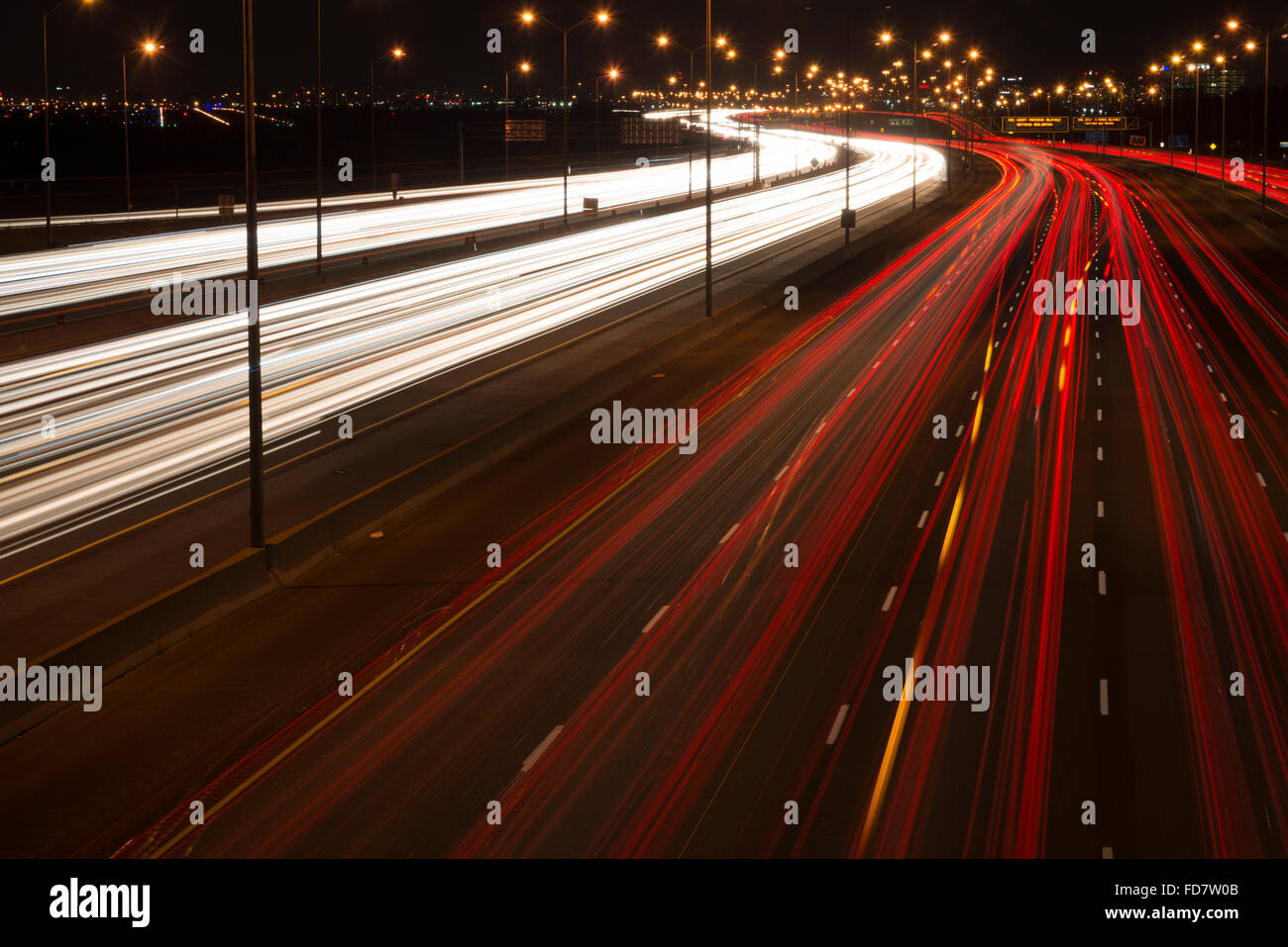 White & red light trails of traffic on highway Stock Photo - Alamy
