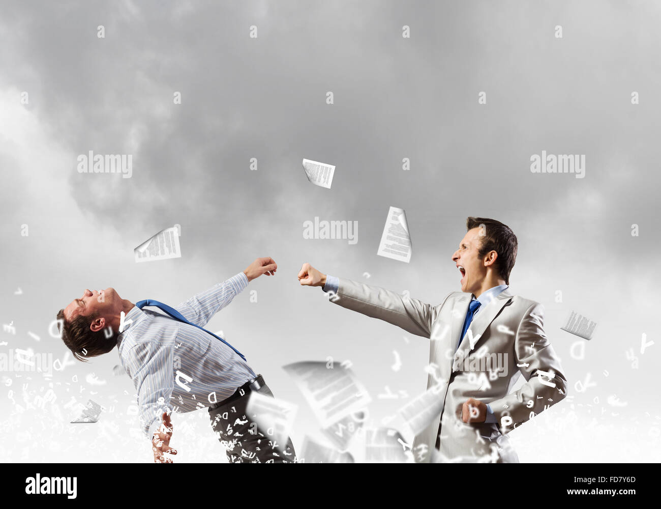 Two businesspeople in anger fighting with each other Stock Photo - Alamy