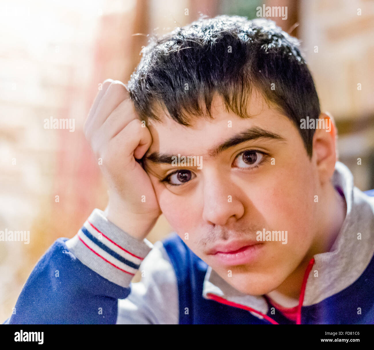 Brooding boy hi-res stock photography and images - Alamy