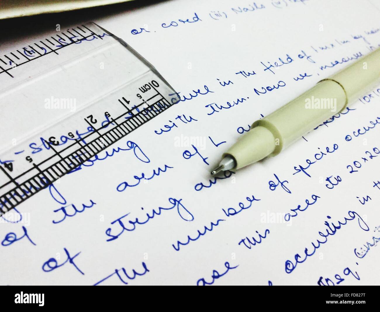 Pen On Piece Of Paper Stock Photo - Alamy