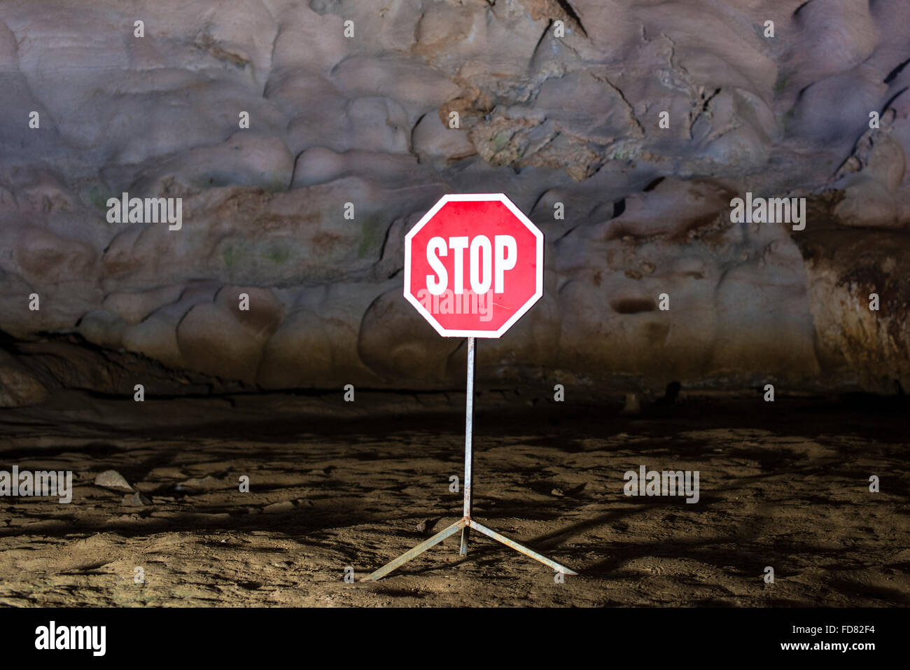 Stop sign in a cave at Halong Bay, Vietnam Stock Photo - Alamy