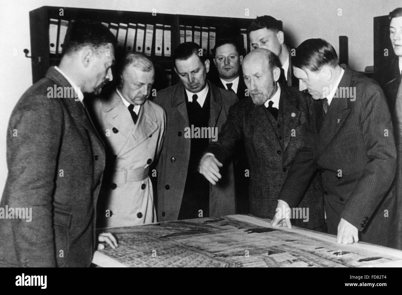 Adolf Hitler with plans for a reconstruction of the 'Deutsches Museum ...