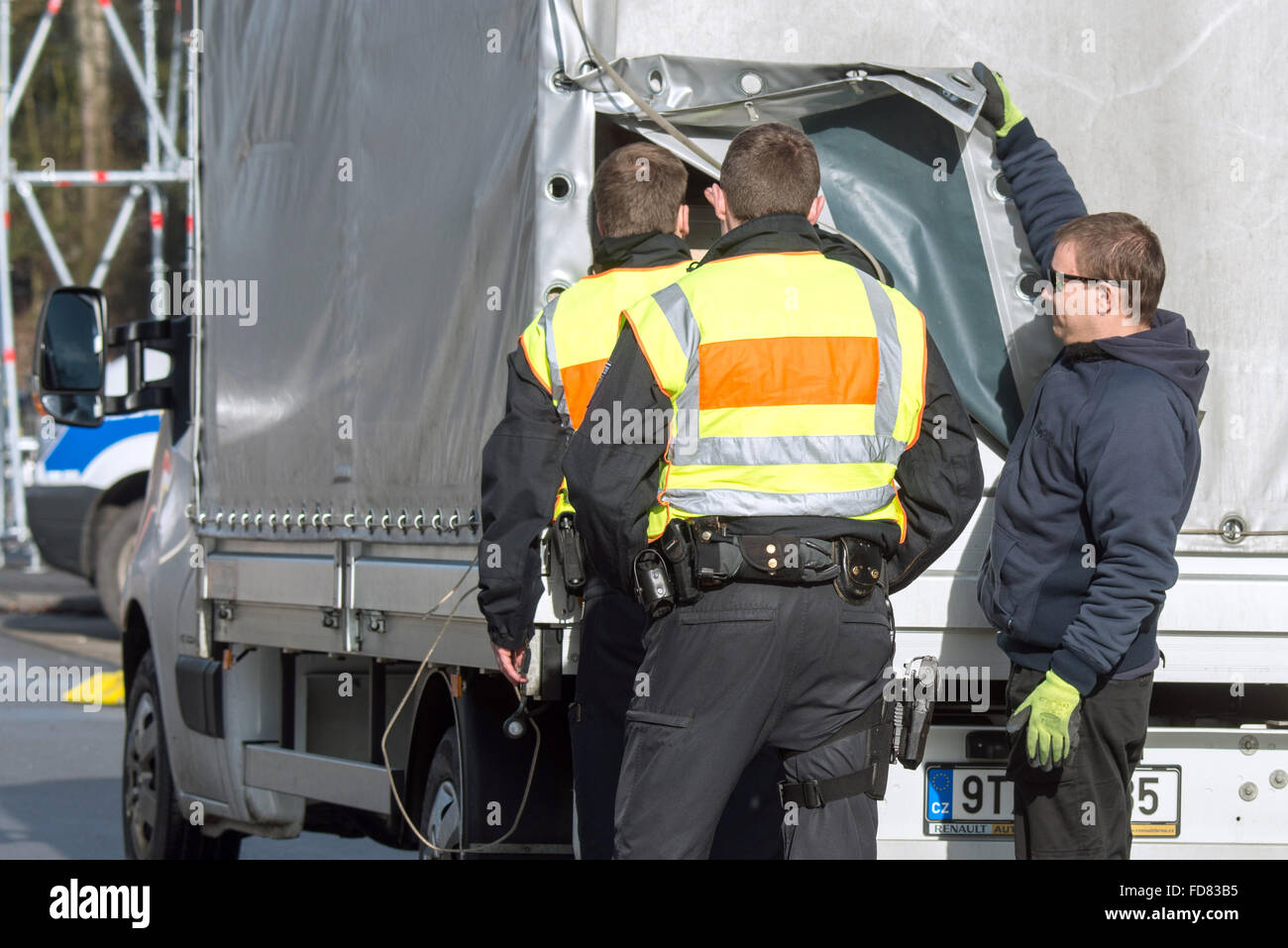 Police officers check a lorry at a German police checkpoint on the ...