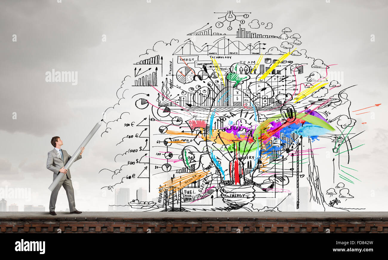 Businessman drawing plan strategy success with huge pencil Stock Photo ...