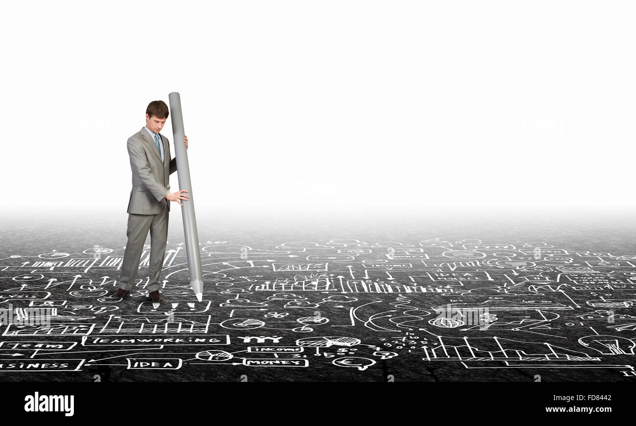 Businessman drawing plan strategy success with huge pencil Stock Photo ...
