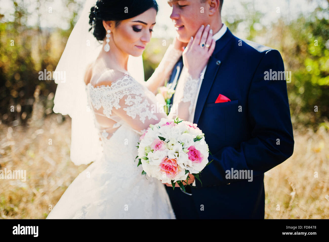 Close up portrait of young stylish weding couple Stock Photo - Alamy