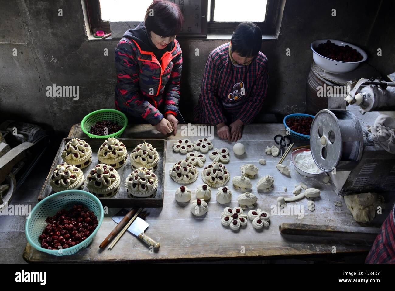 Chiping, Chiping, CHN. 28th Jan, 2016. Flower-shaped pastries. © SIPA ...