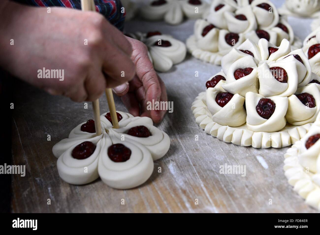 Chiping, Chiping, CHN. 28th Jan, 2016. Flower-shaped pastries. © SIPA ...