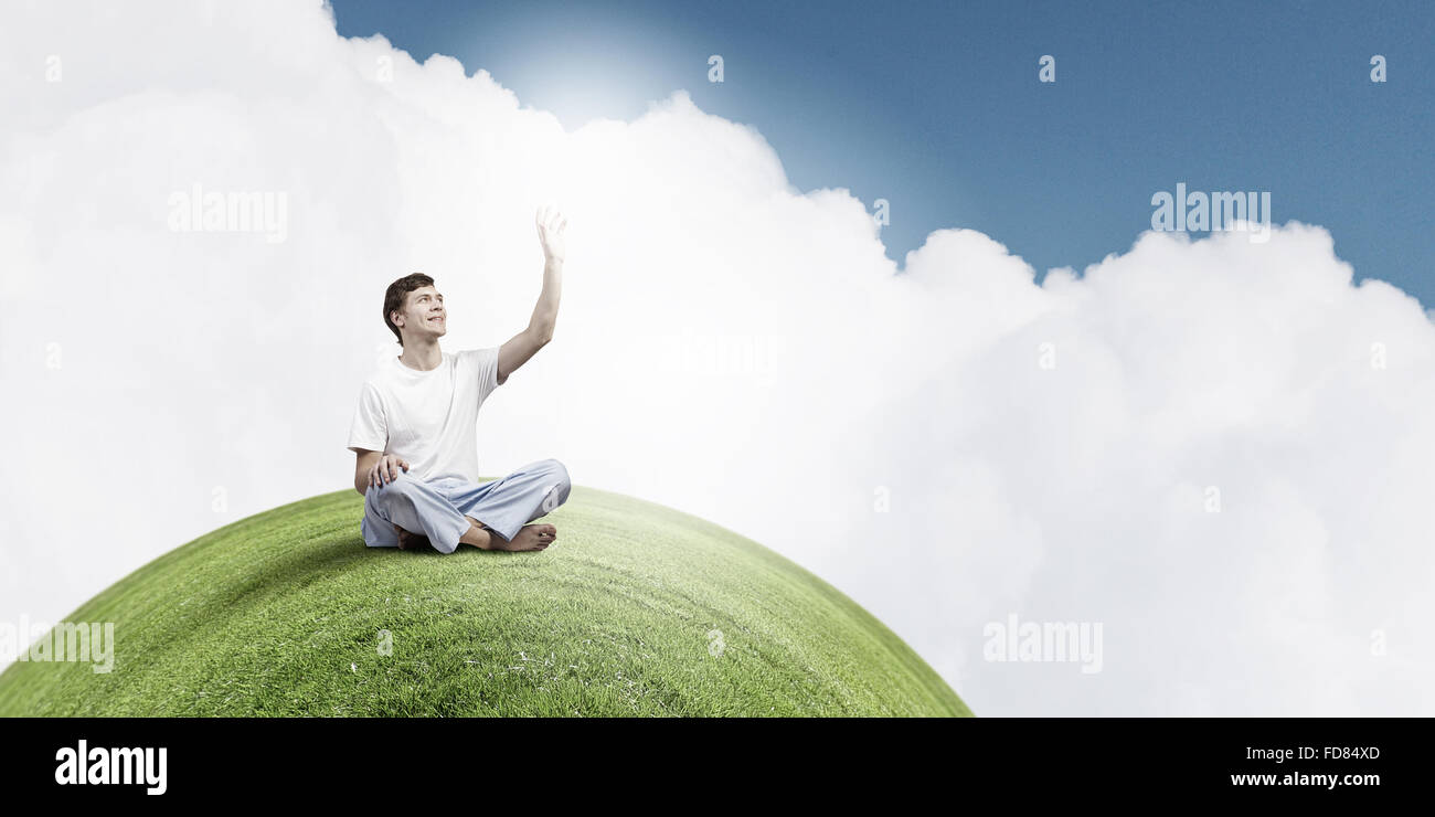 Young man representing soul balance and meditation concept Stock Photo ...