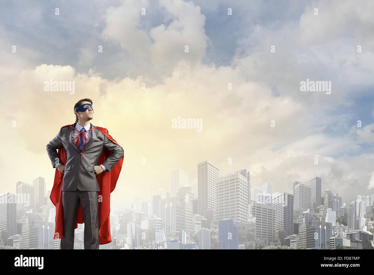 Young man in superhero costume representing power and courage Stock ...