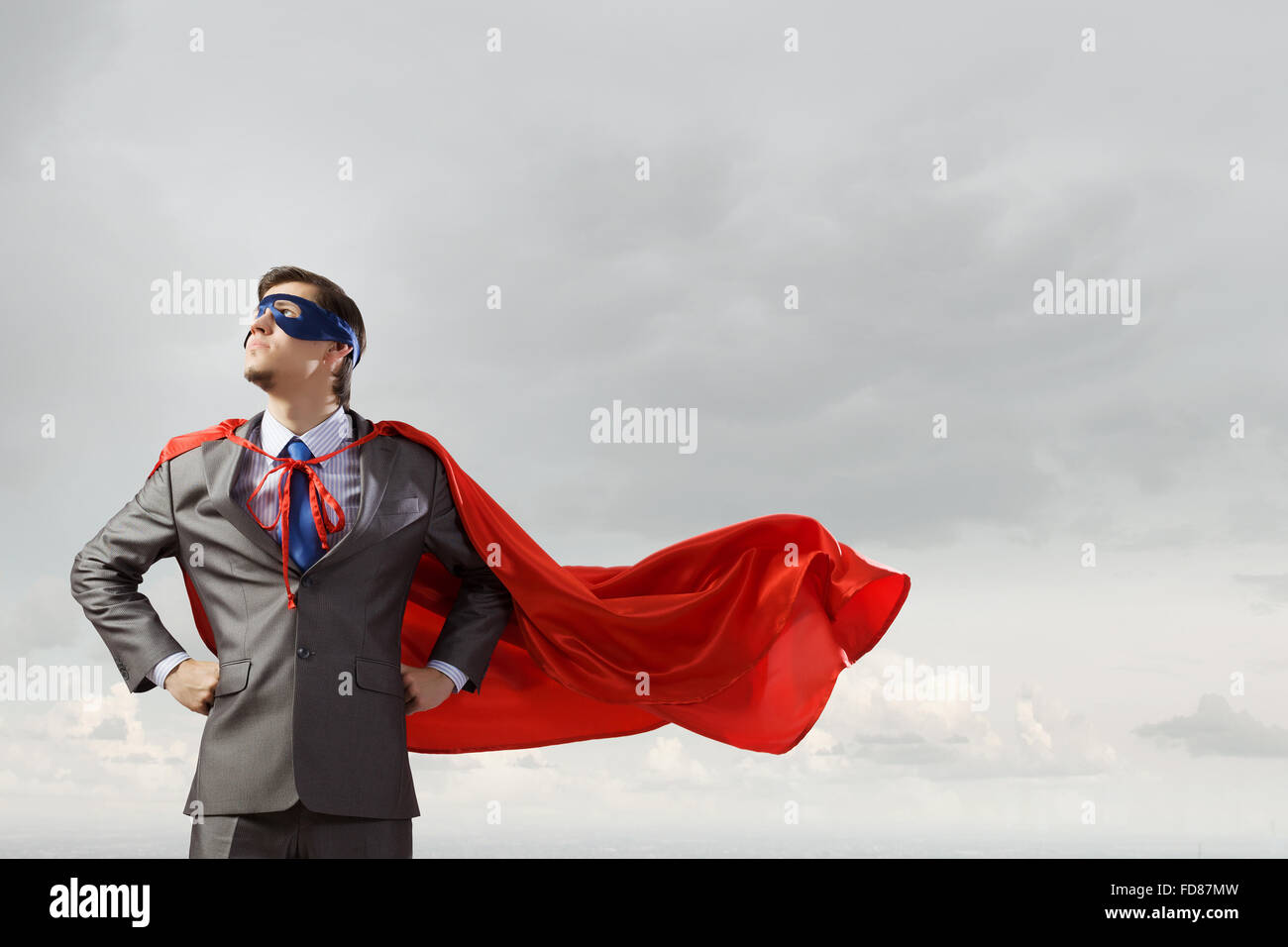 Young man in superhero costume representing power and courage Stock ...