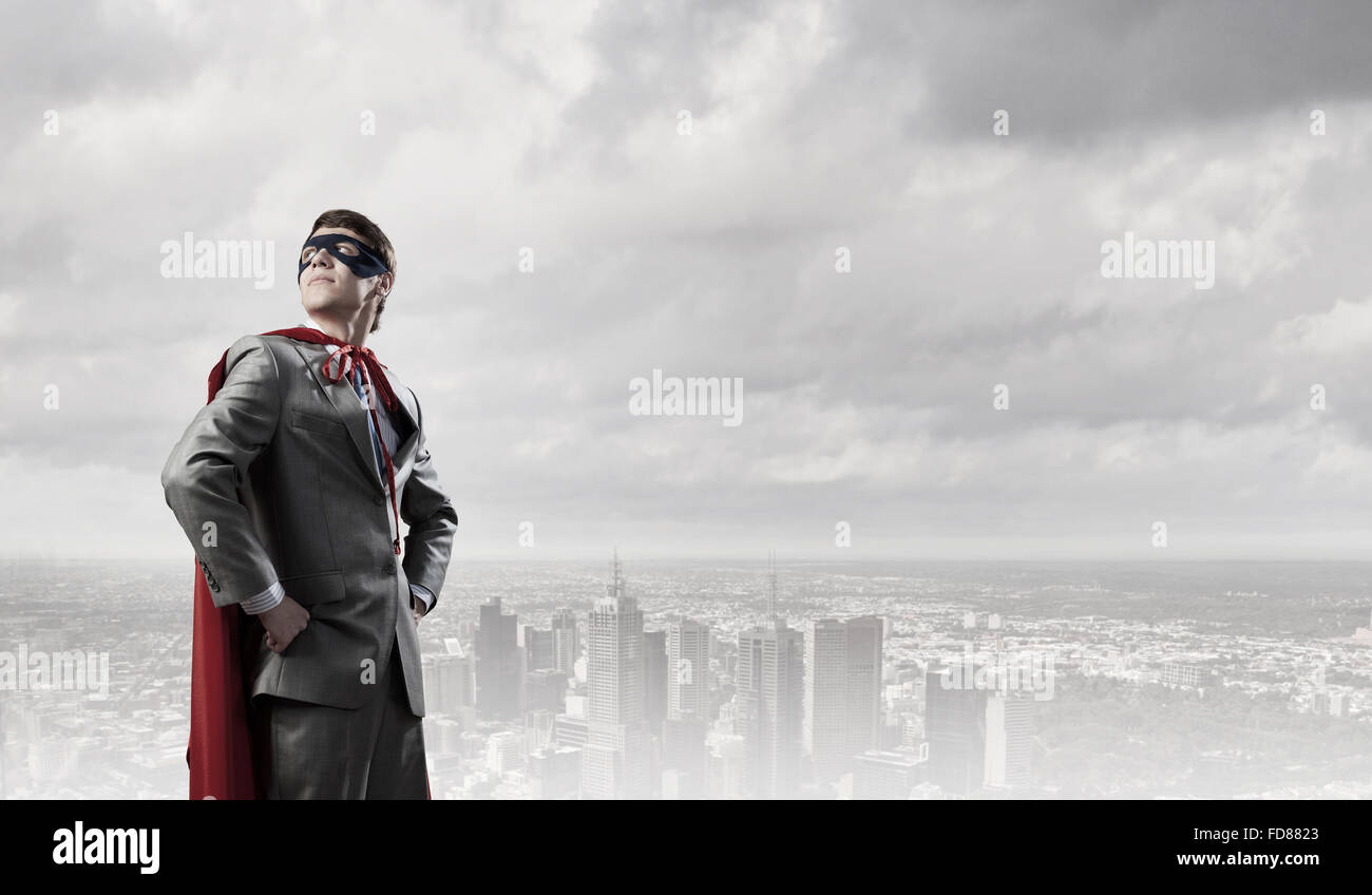Young man in superhero costume representing power and courage Stock ...