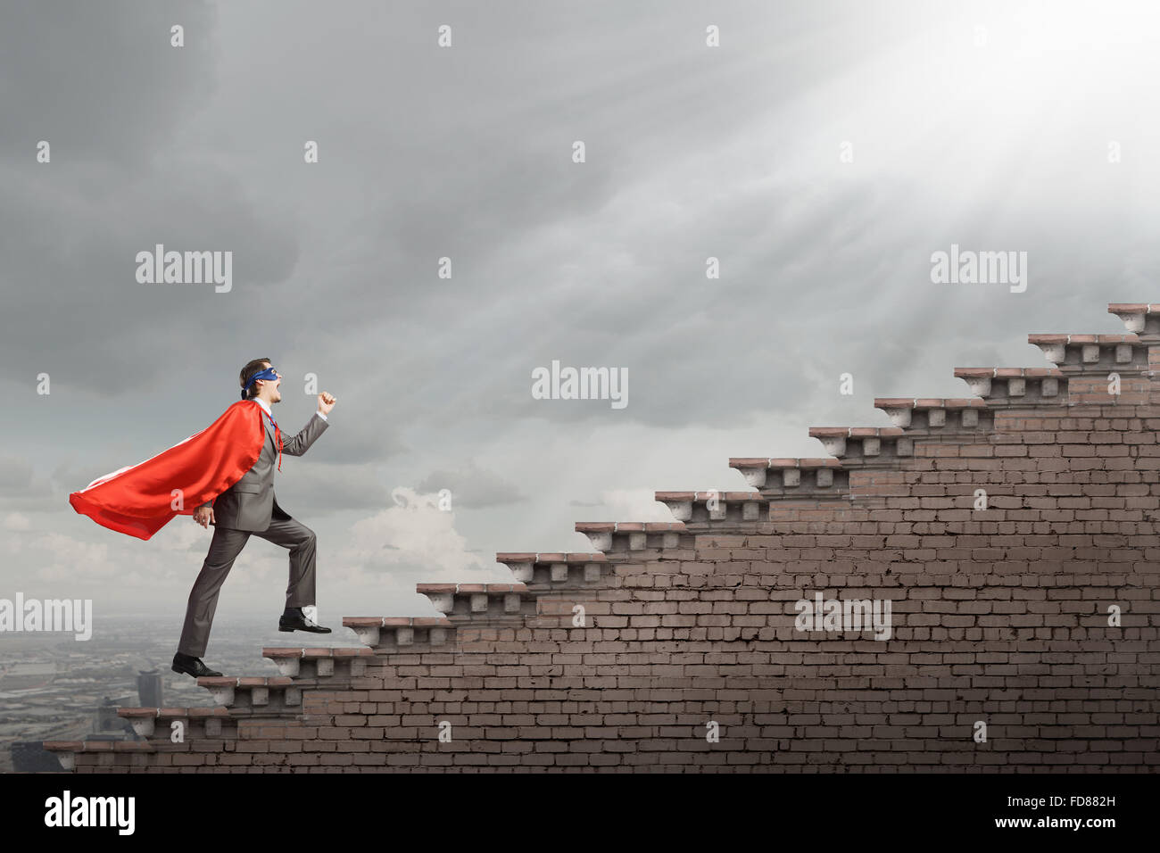 Young man in superhero costume representing power and courage Stock ...