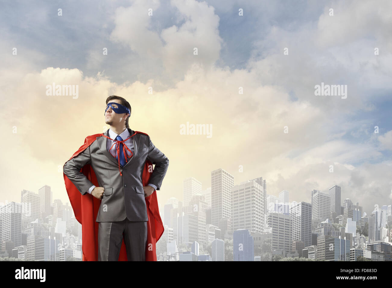 Young man in superhero costume representing power and courage Stock ...