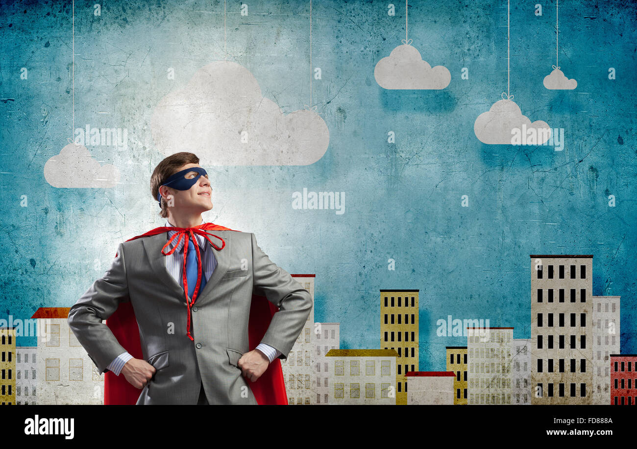 Young man in superhero costume representing power and courage Stock ...