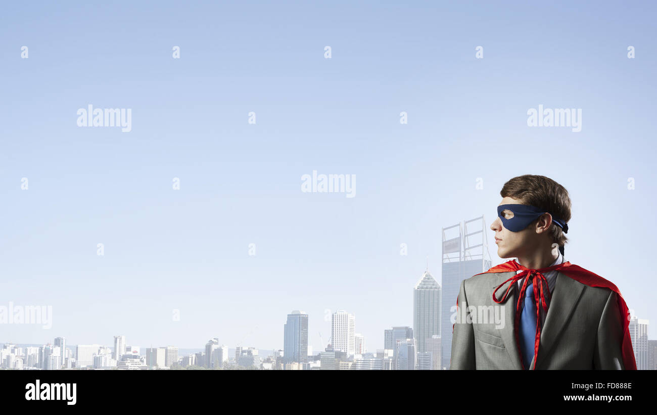 Young man in superhero costume representing power and courage Stock ...