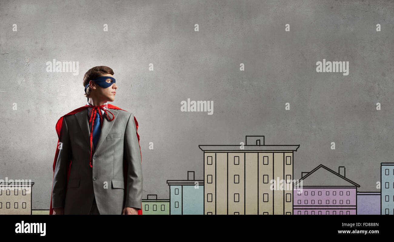 Young man in superhero costume representing power and courage Stock ...