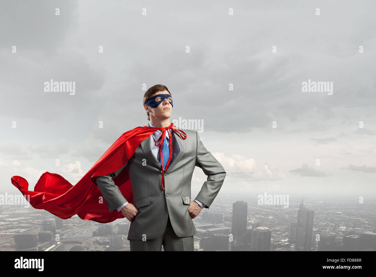 Young man in superhero costume representing power and courage Stock ...