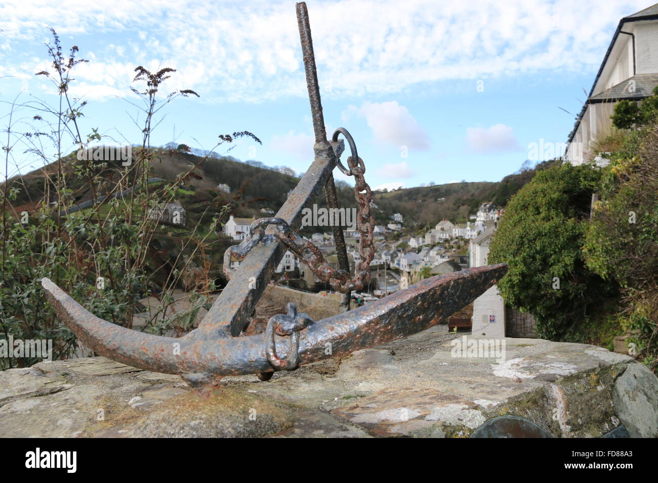 rusty anchor in Cornish village Stock Photo - Alamy