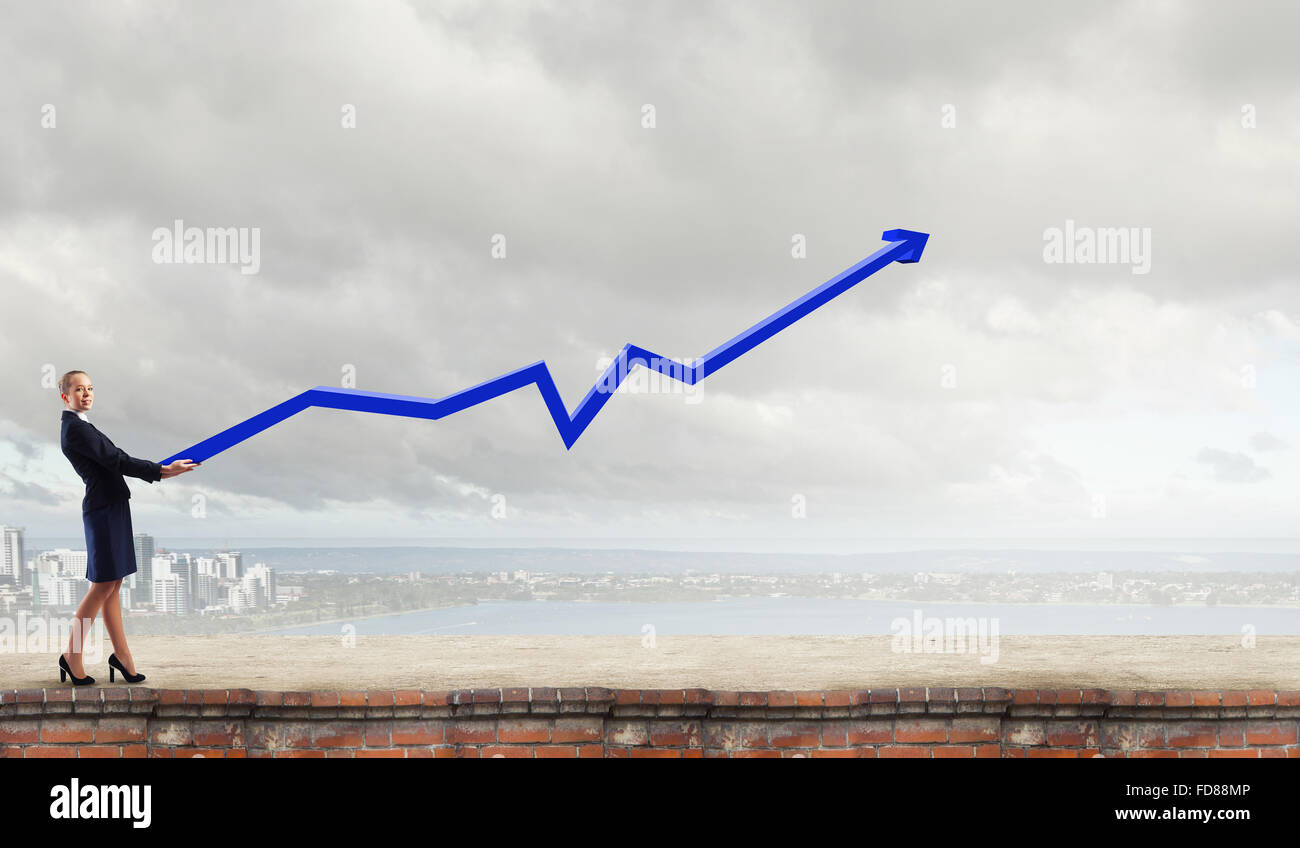 Businesswoman carrying big increasing graph. Growth concept Stock Photo ...