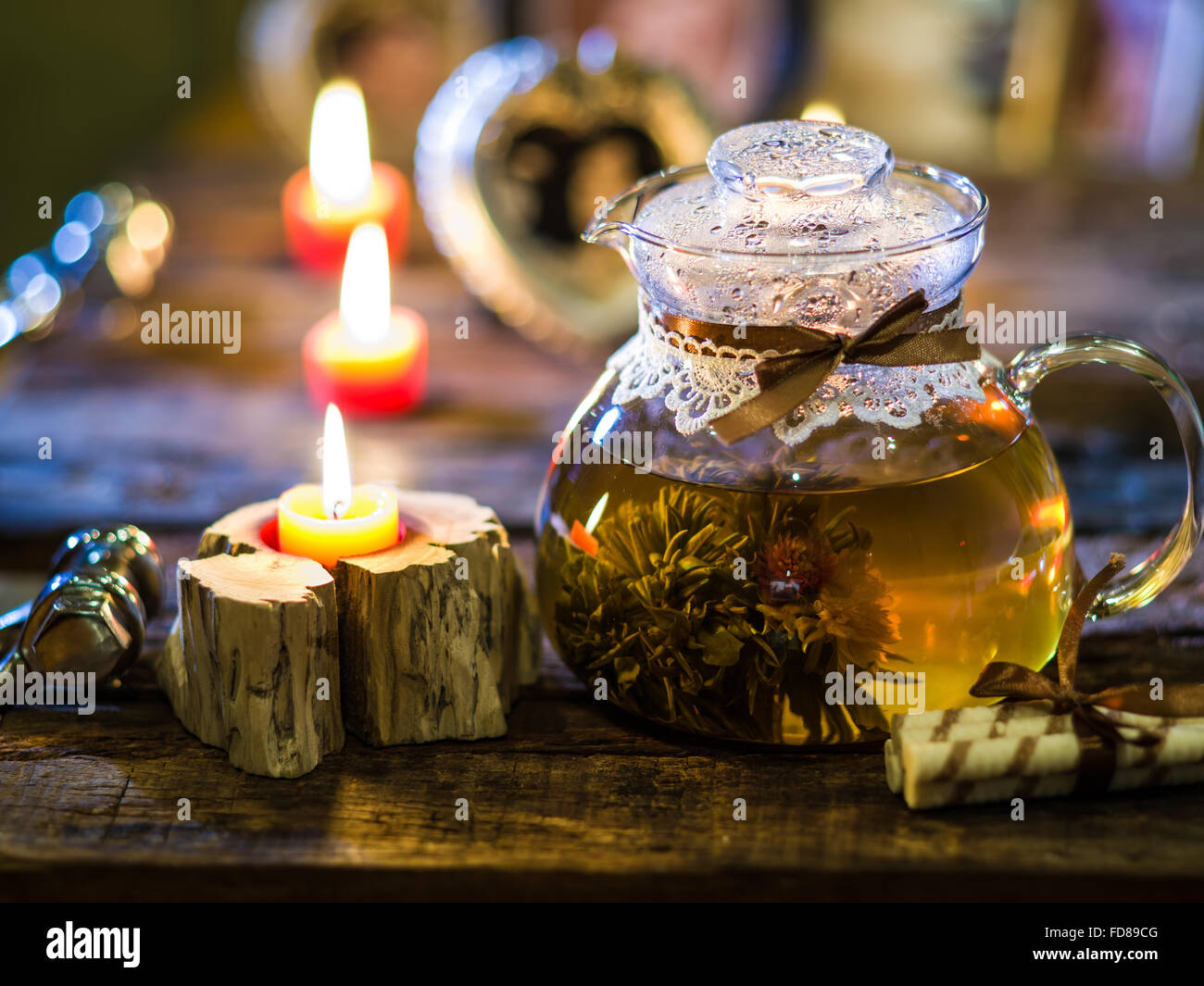 exotic green tea with flowers in glass teapot Stock Photo - Alamy