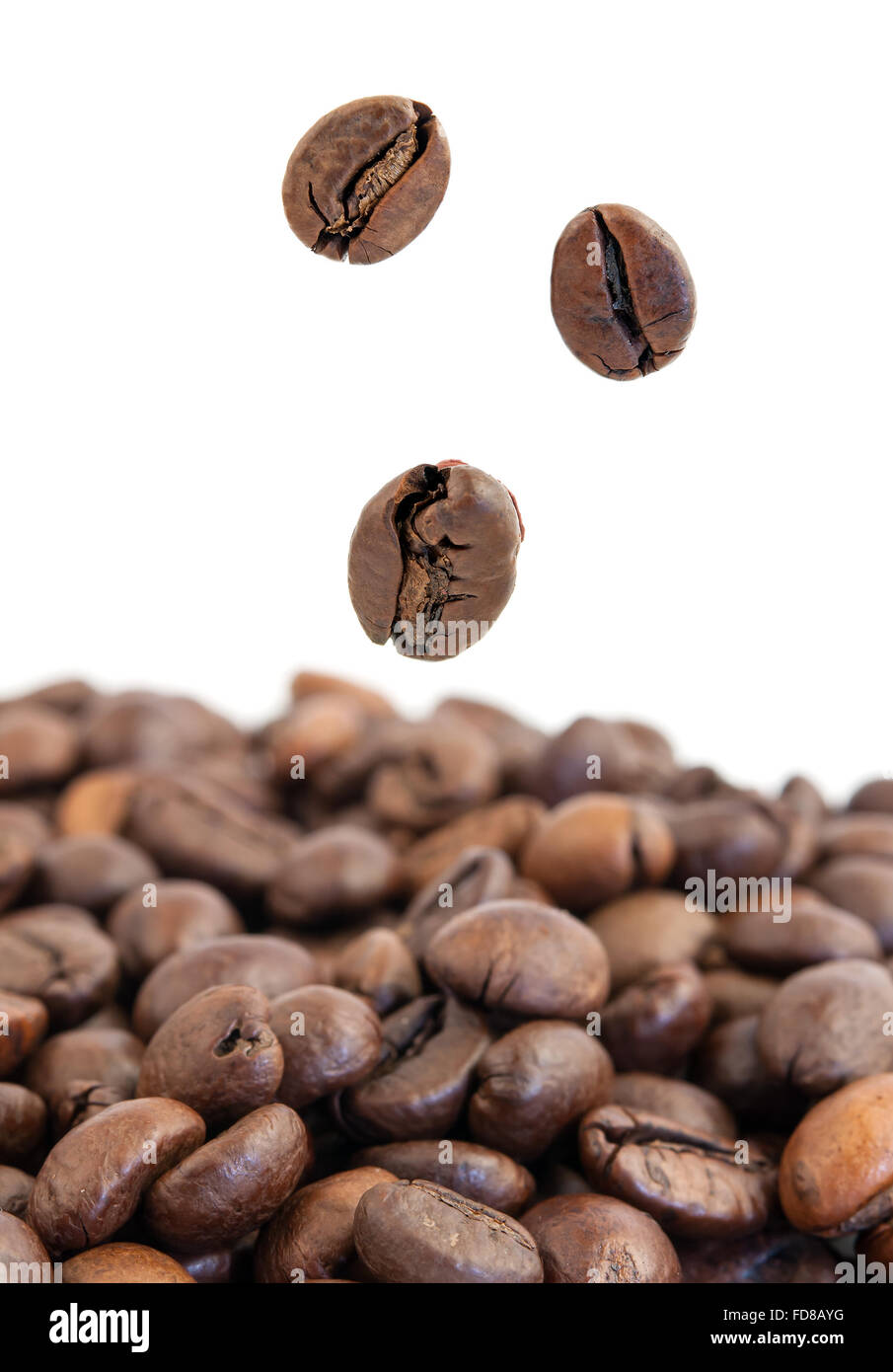 flying coffee beans isolated on white background Stock Photo - Alamy