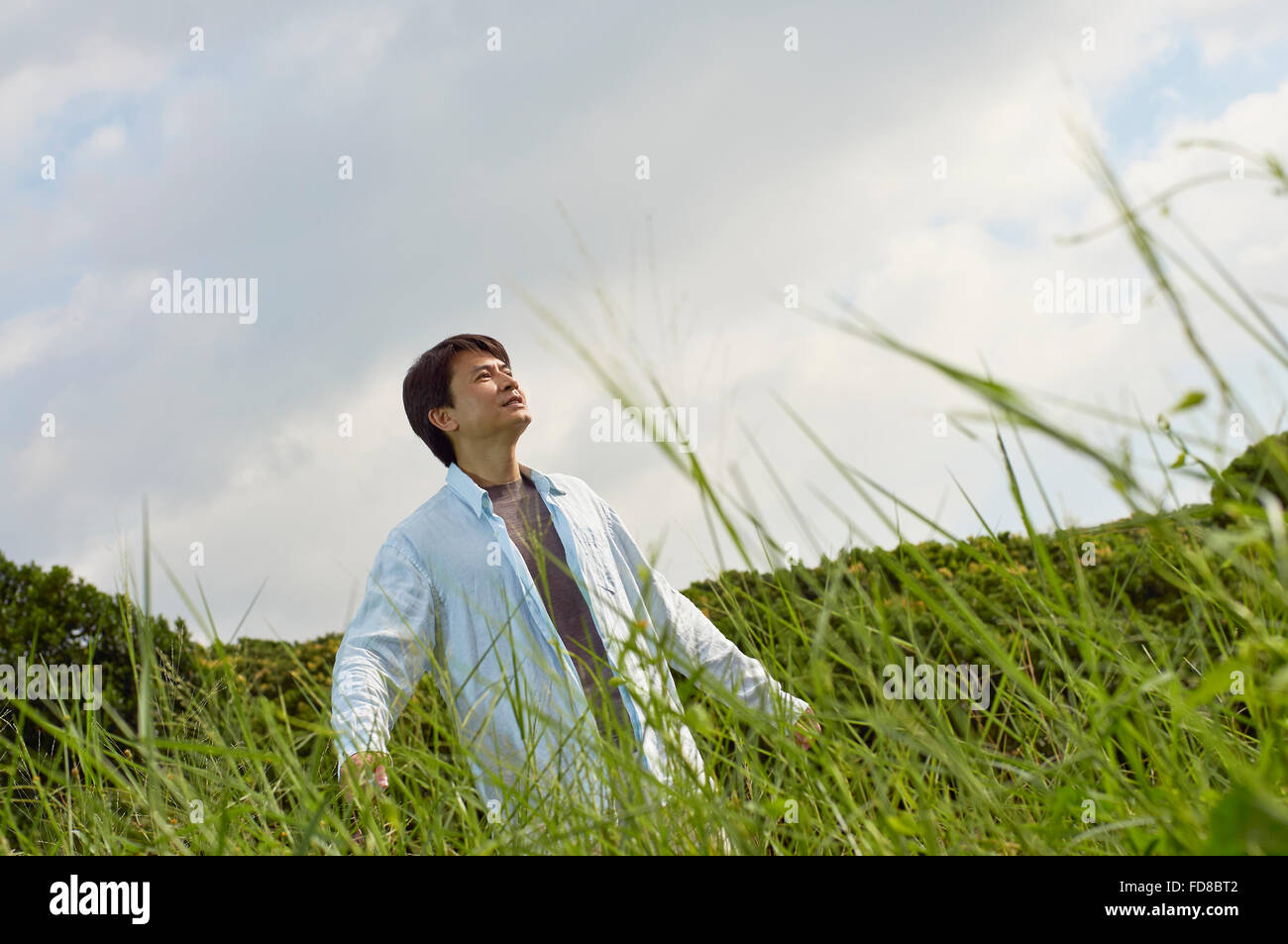Chinese man walking hi-res stock photography and images - Alamy