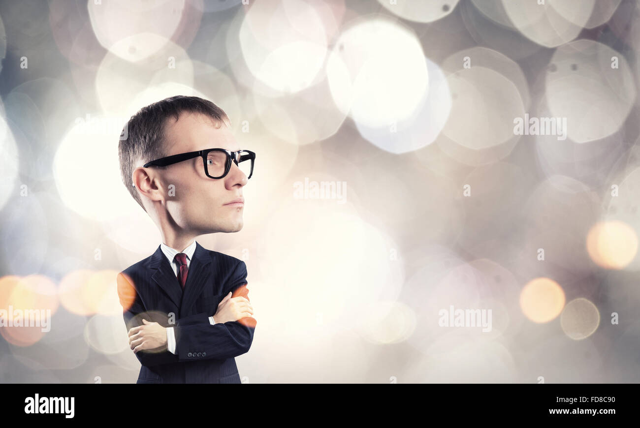 Young funny man in glasses with big head Stock Photo - Alamy