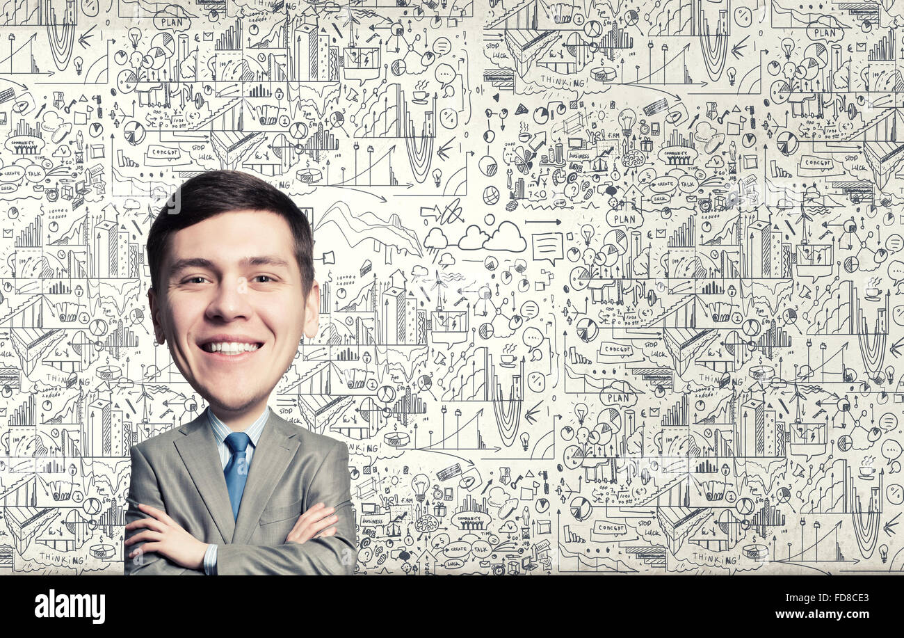 Young man with big head thinking about something Stock Photo - Alamy