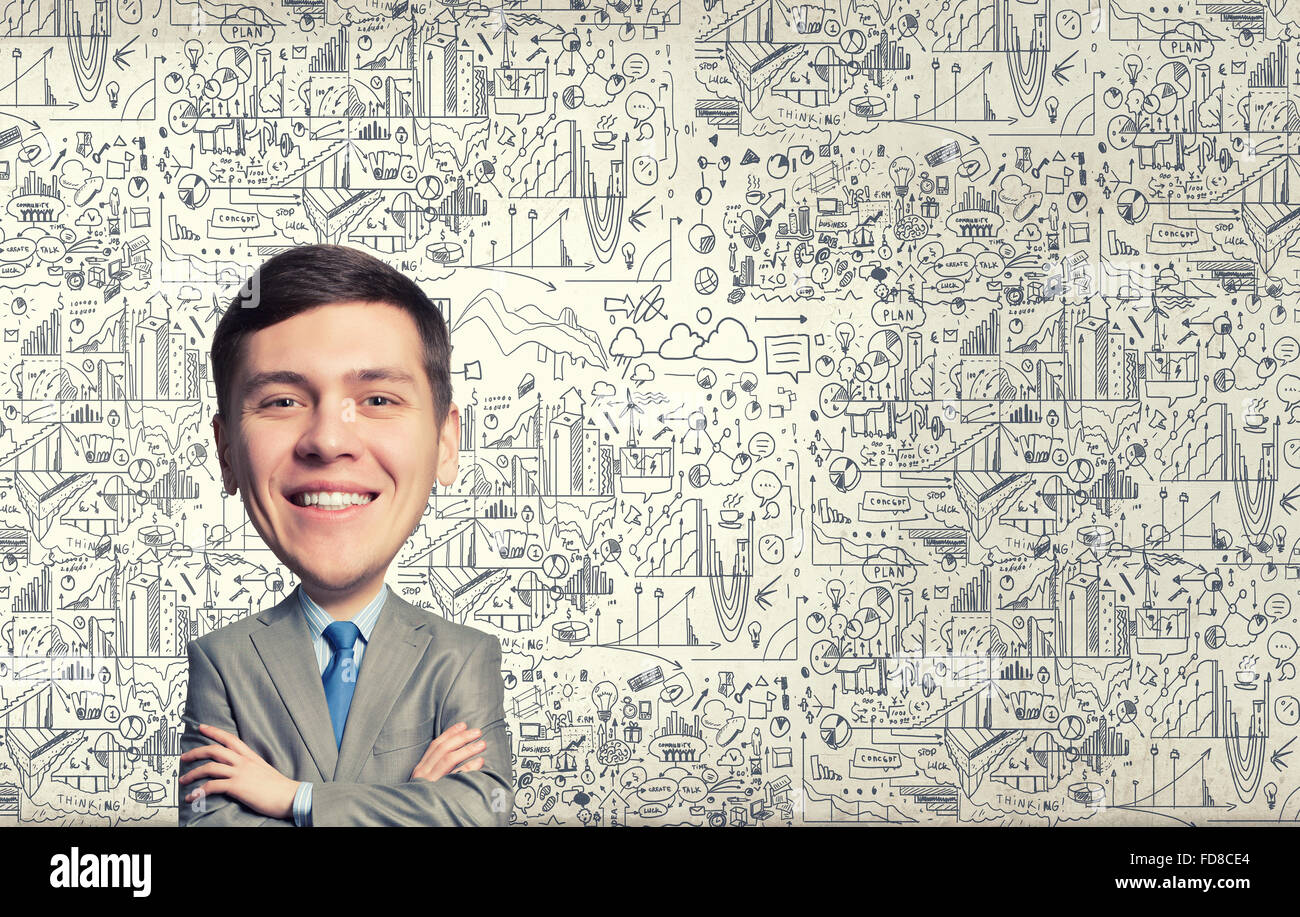 Young man with big head thinking about something Stock Photo - Alamy