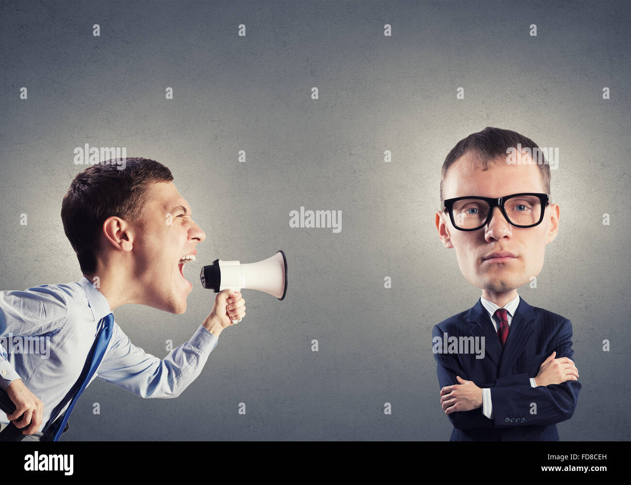 Funny young man with big head screaming emotionally in megaphone Stock ...