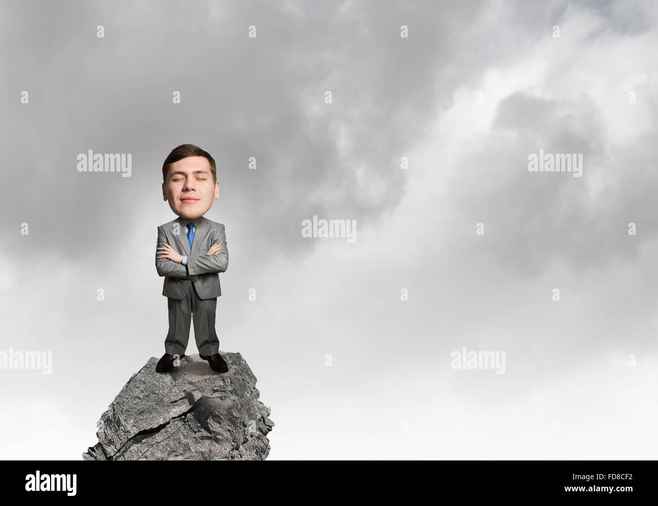 Young man with big head thinking about something Stock Photo - Alamy