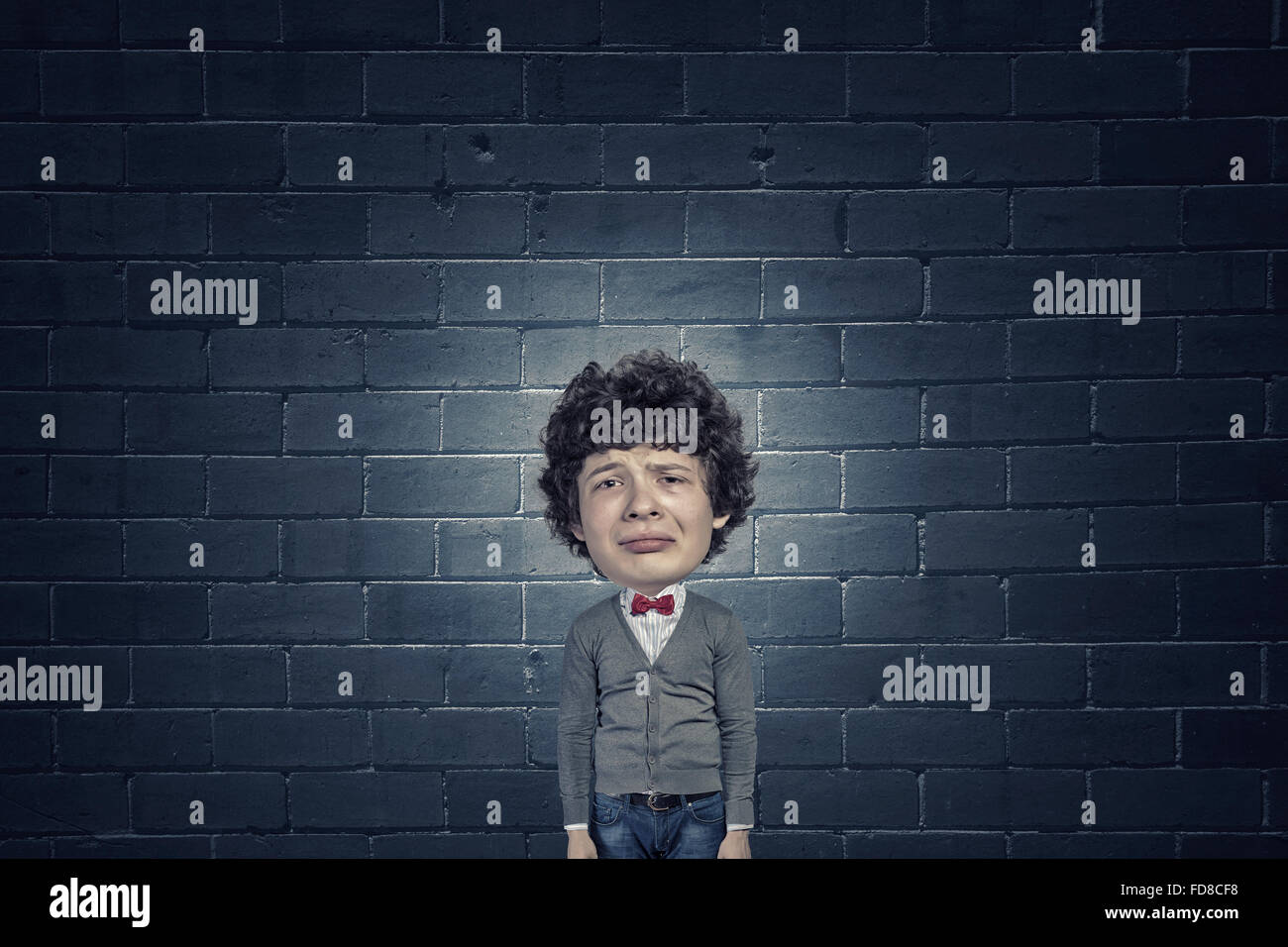 Young man with big head thinking about something Stock Photo - Alamy