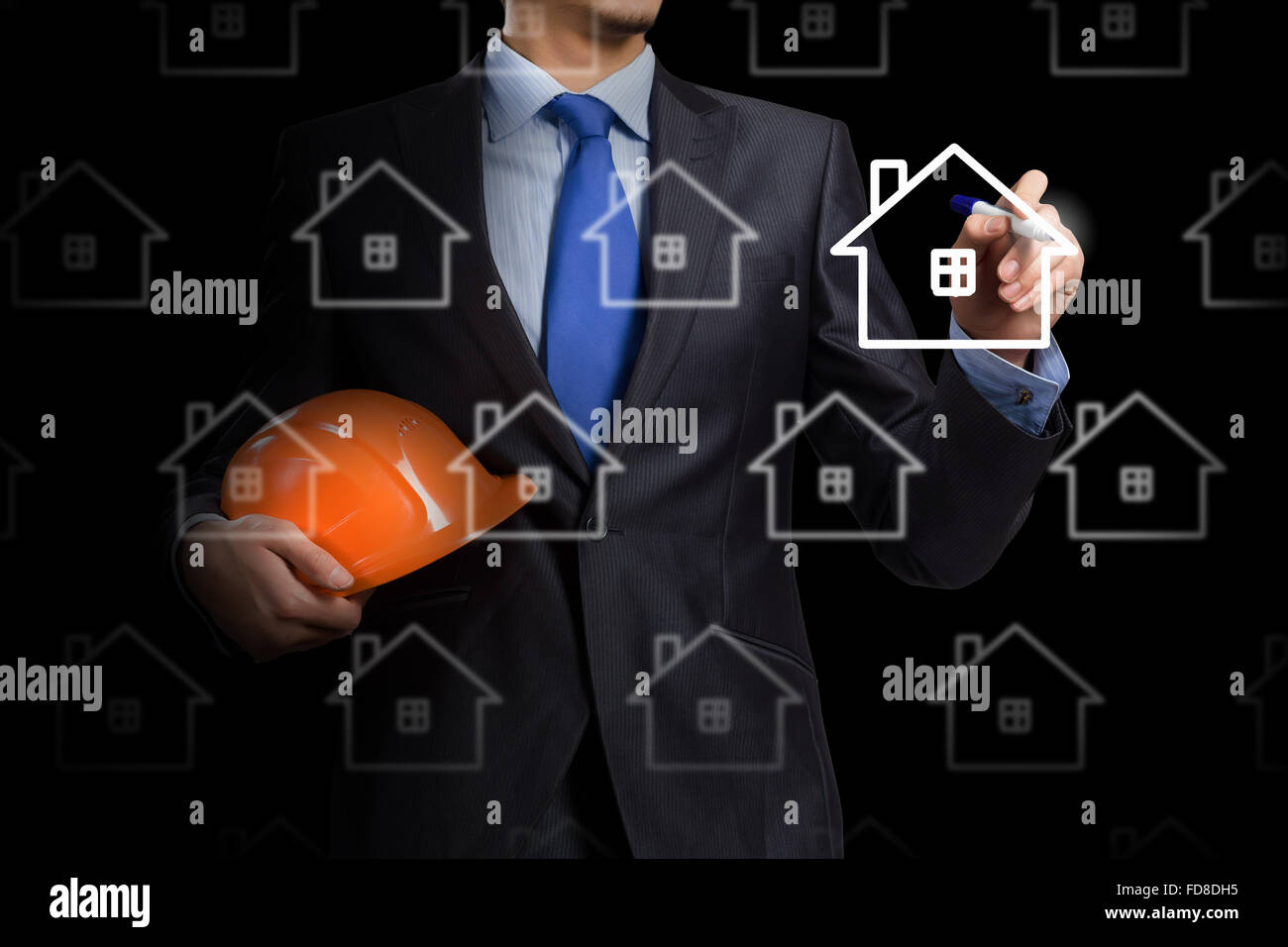 Young man engineer drawing sketches of construction project Stock Photo ...