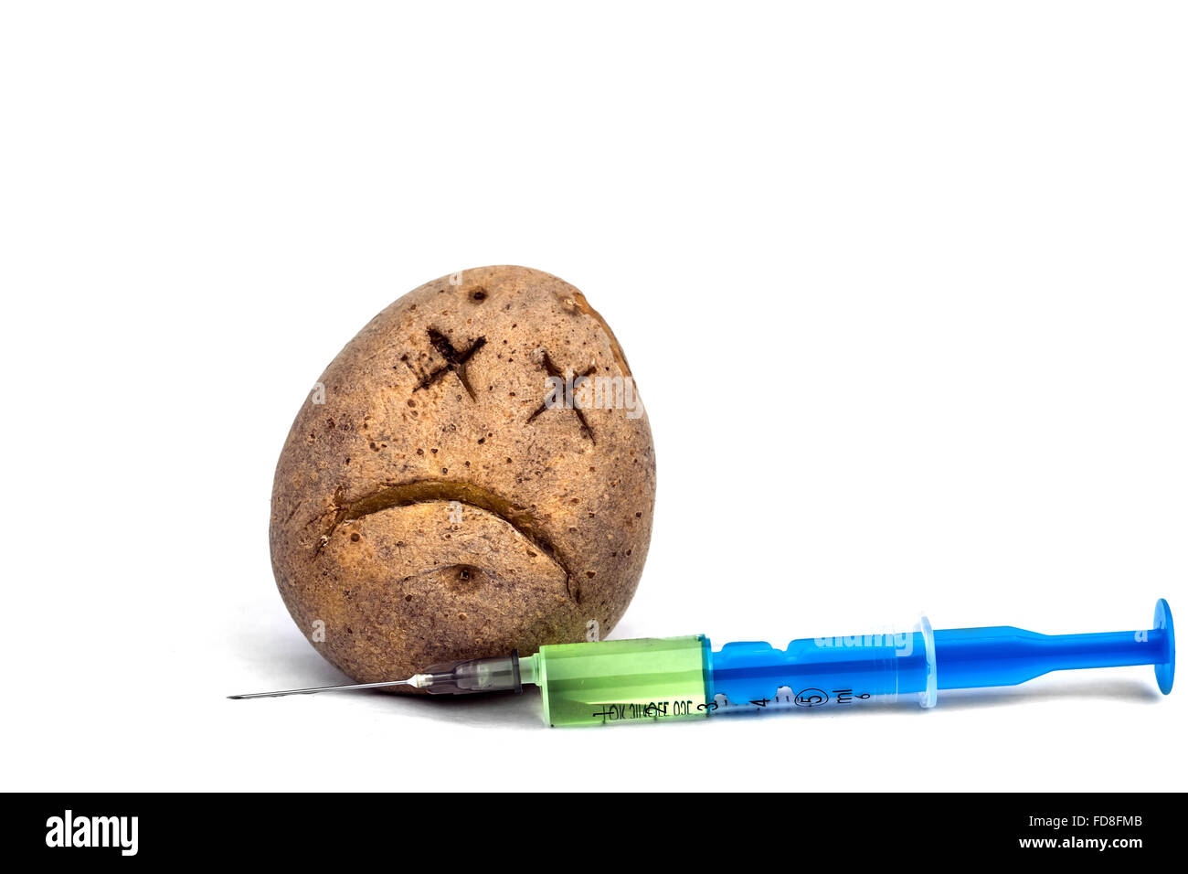 Sad/scared potato with syringe Stock Photo - Alamy