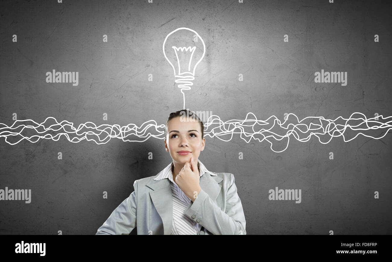 Young thoughtful woman and ideas coming out of her head Stock Photo - Alamy