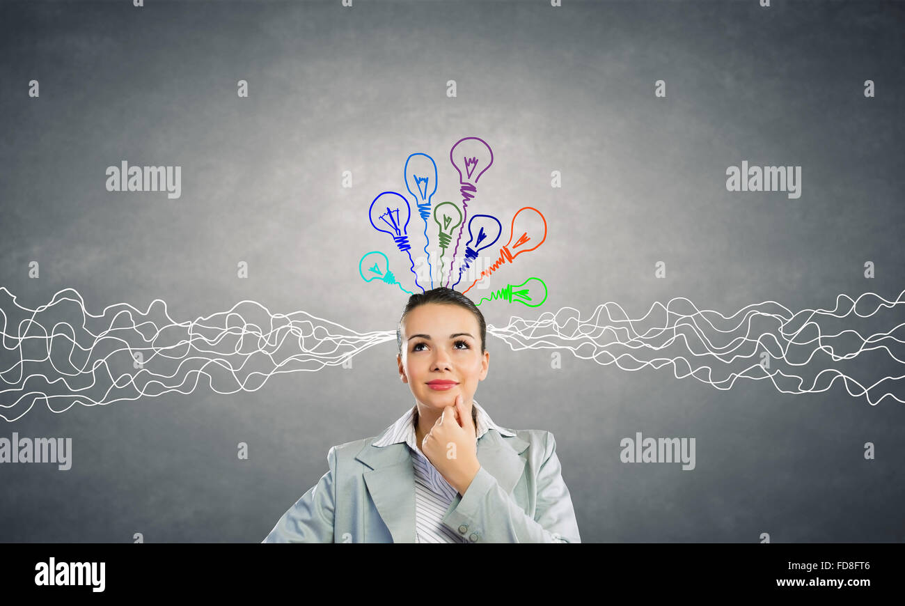 Young thoughtful woman and ideas coming out of her head Stock Photo - Alamy