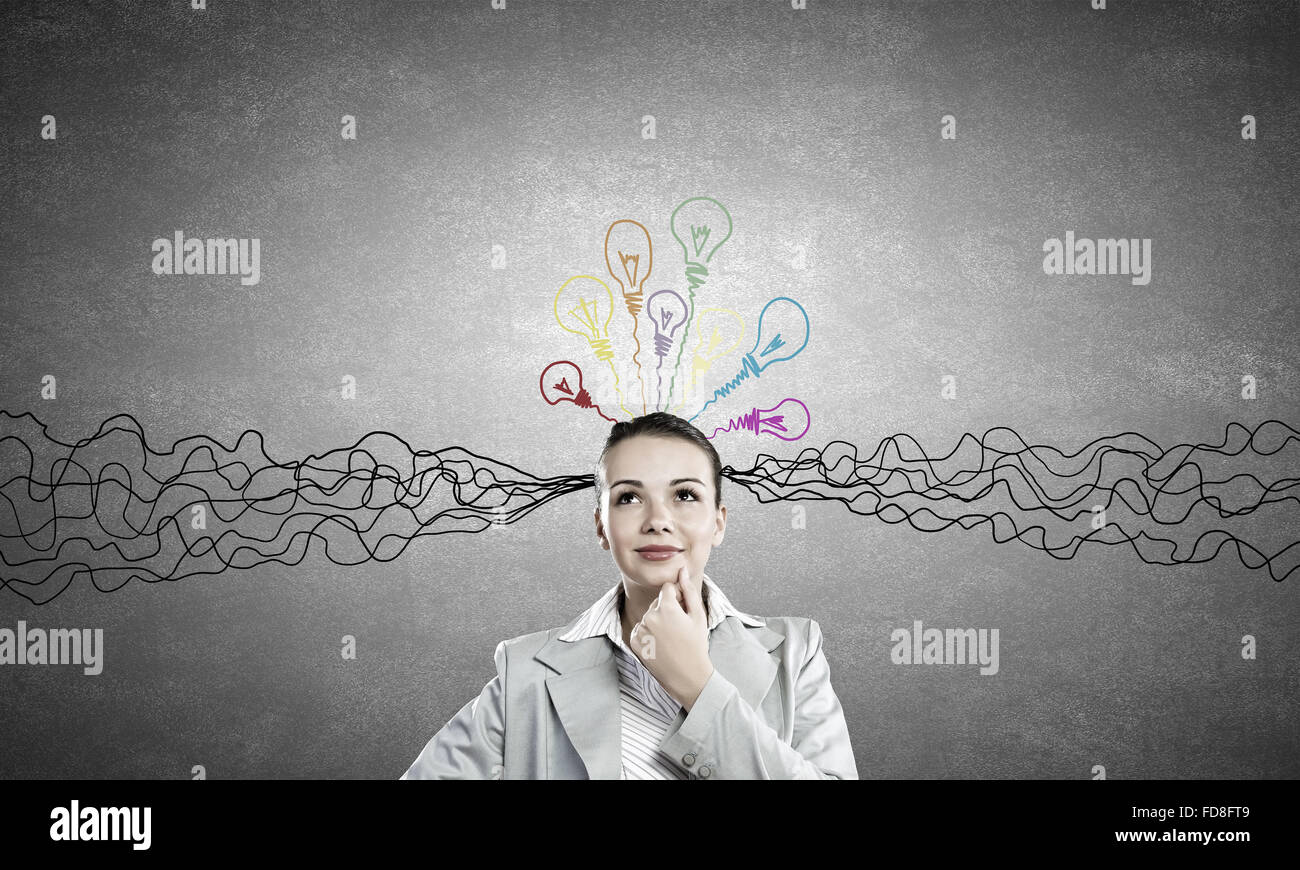 Young thoughtful woman and ideas coming out of her head Stock Photo - Alamy