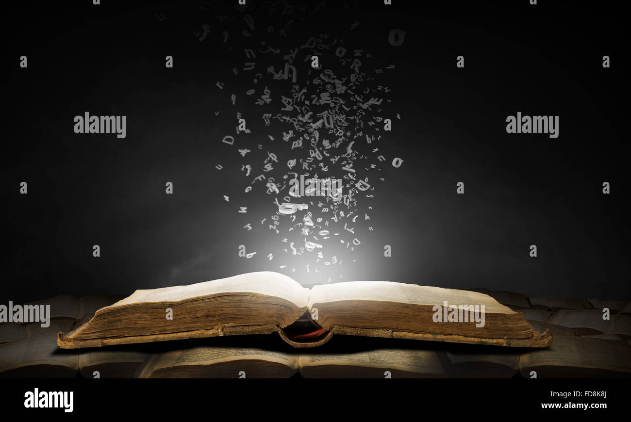Old opened book characters flying hi-res stock photography and images ...