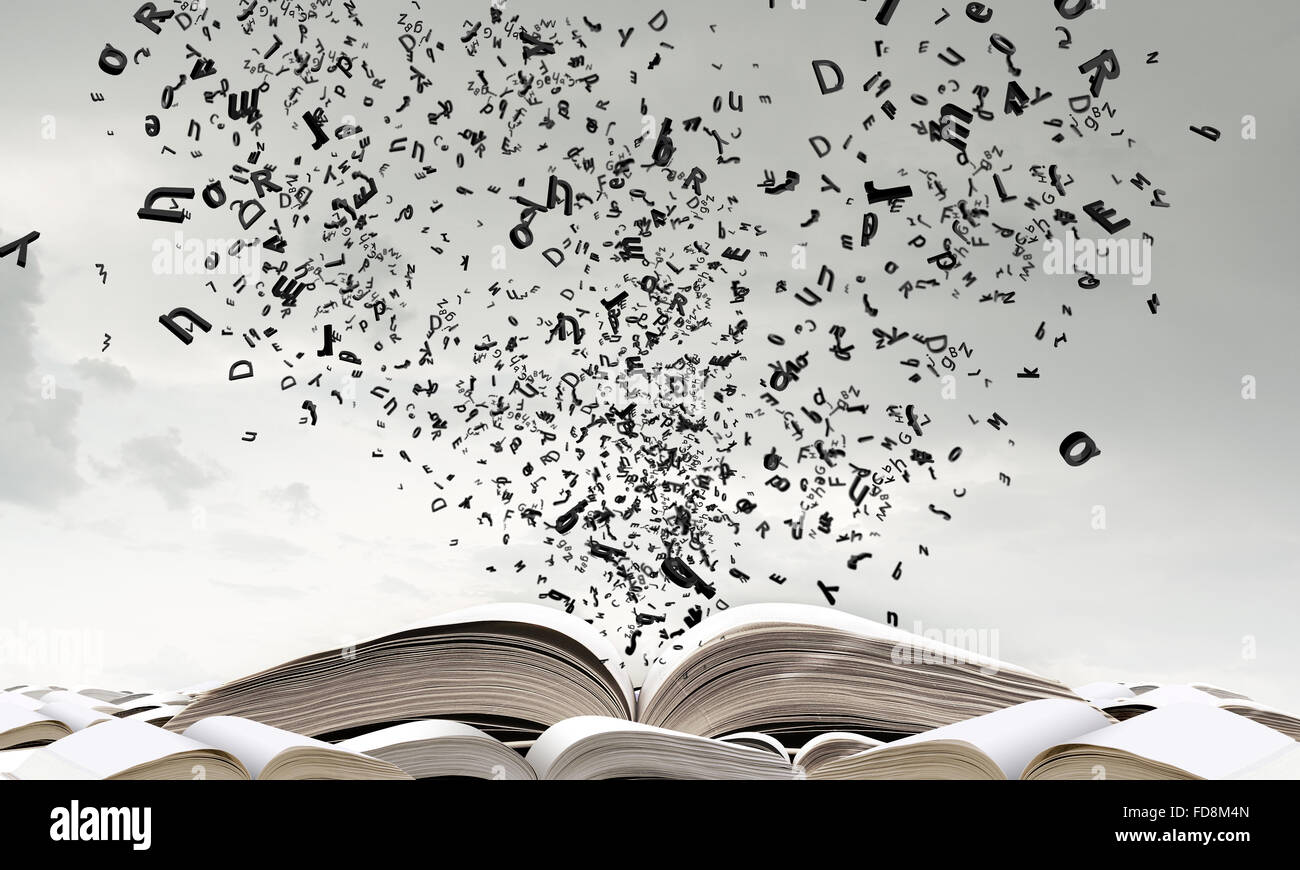 Old opened book characters flying hi-res stock photography and images ...